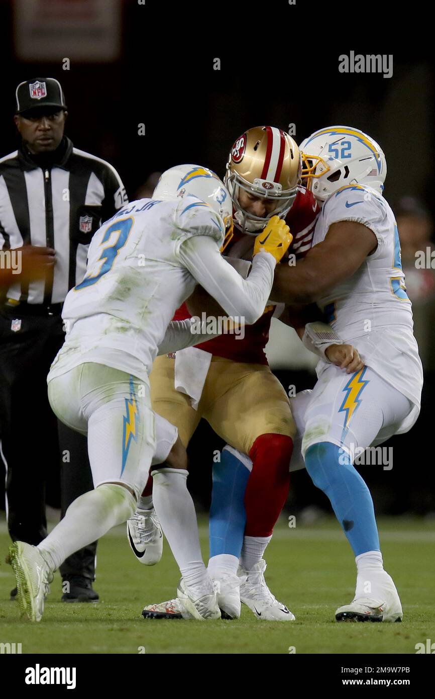 San Francisco 49ers quarterback Jimmy Garoppolo (10) is sacked by Los ...