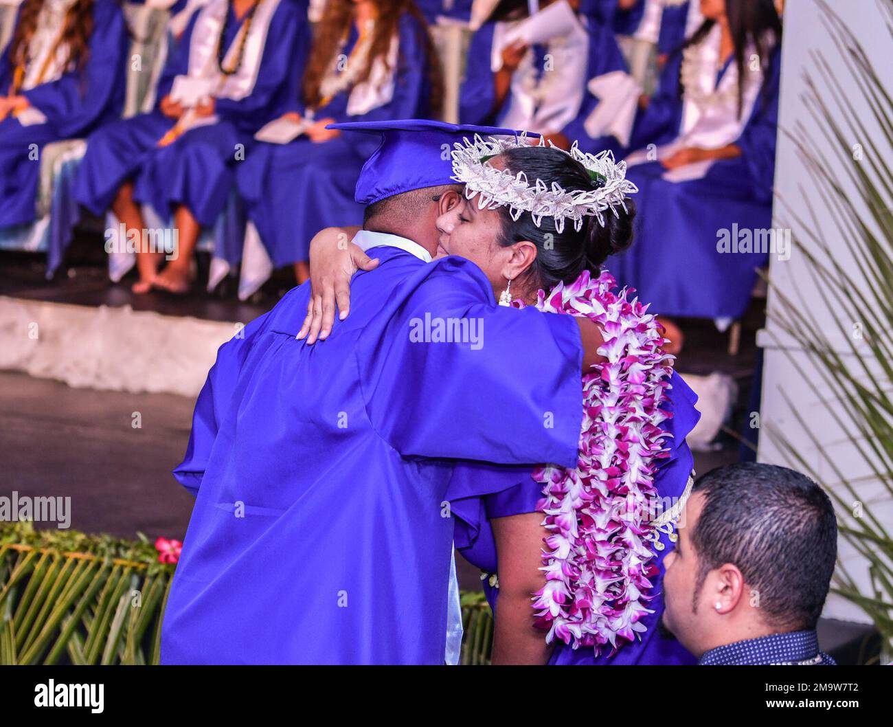 Kwajalein High School graduating senior Litokne Kabua, left, hugs ...