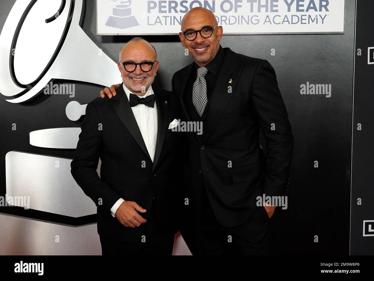 Manuel Abud, CEO of the Latin Recording Academy, left, and Harvey Mason ...