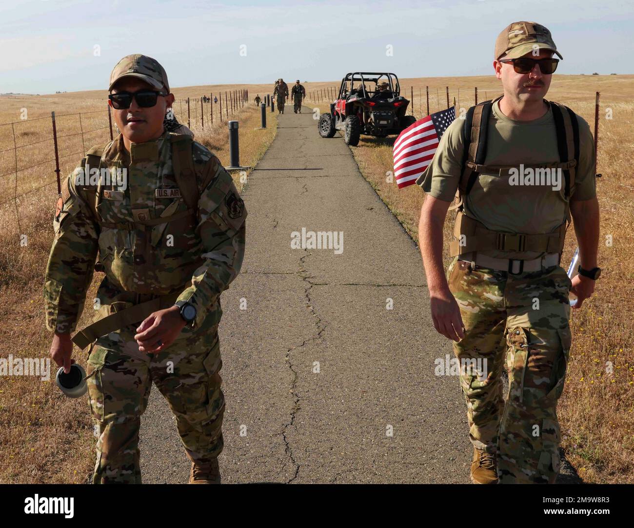 Airmen from the 9th Security Forces Squadron participate in a 14-mile ...