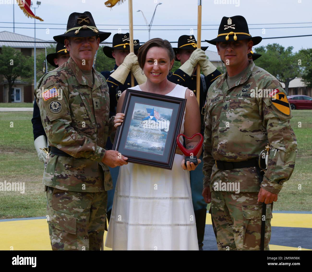 Mrs. Rebecca Deloach, 1st Air Cavalry Brigade, receives the 'Heart' trophy during the 1st ...