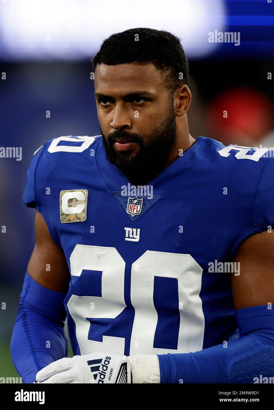 New York Giants safety Julian Love (20) walks off the field after an ...