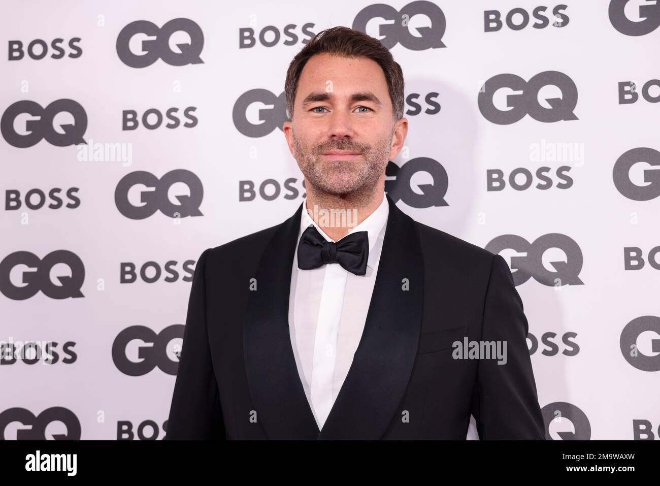 Eddie Hearn poses for photographers upon arrival at the GQ Men of the ...