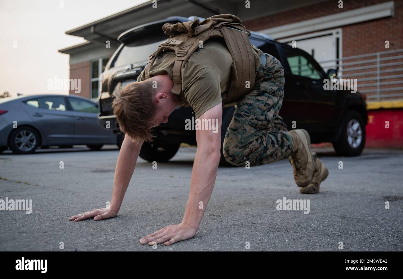 U.S. Marine Corps Cpl. Michael Virtue, a combat graphics specialist ...