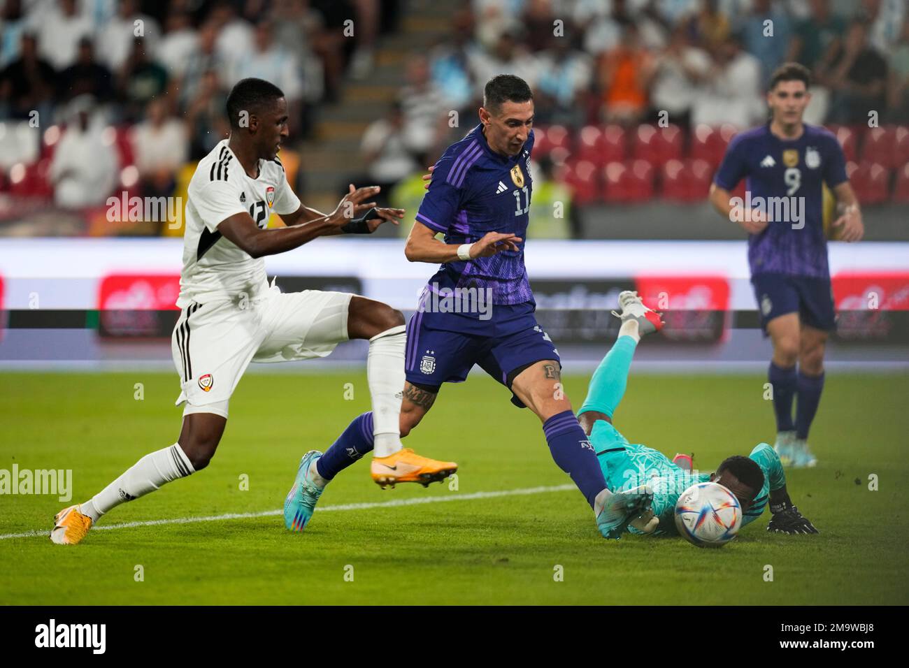 Argentina's Angel Di Maria scores between Khalifa Alhammadi of the ...