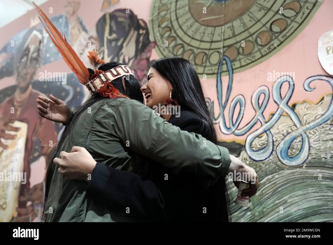 Helena Gualinga, climate activist from Ecuador, right, embraces Gloria ...