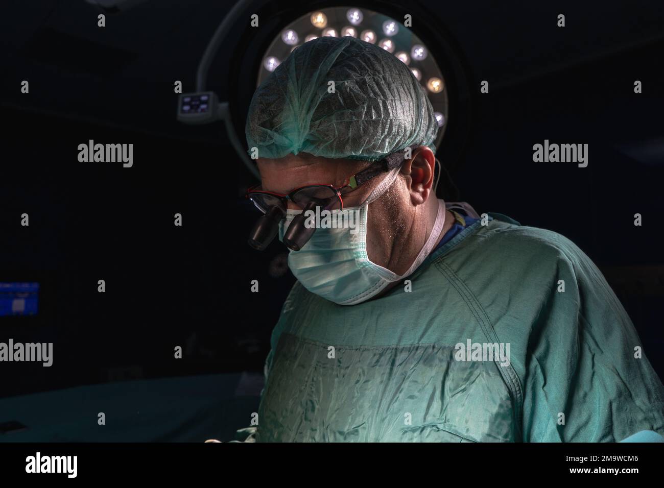 Open heart surgery doctor perform open heart surgery. Doctors in green ...