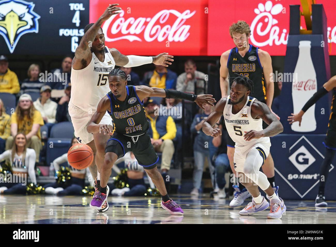 Morehead State guard Mark Freeman (0) is defended by West Virginia ...