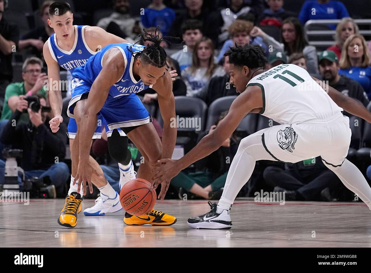 Kentucky forward Jacob Toppin, left, and Michigan State guard A.J ...