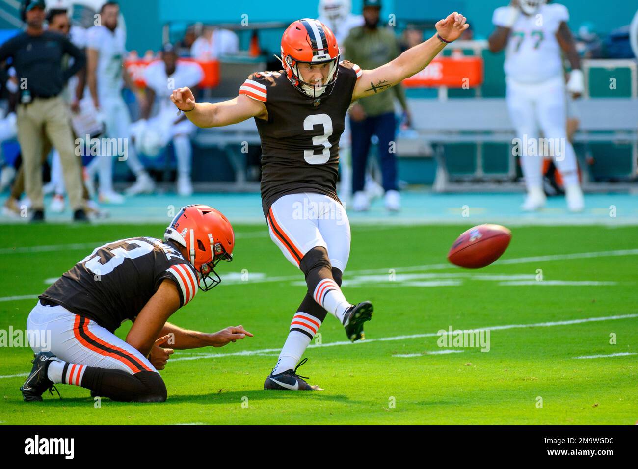 Cleveland Browns punter Corey Bojorquez (13) holds the ball as ...