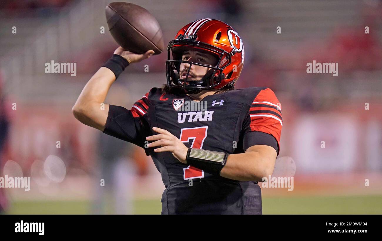 Utah quarterback Cameron Rising (7) warms up before their NCAA college ...