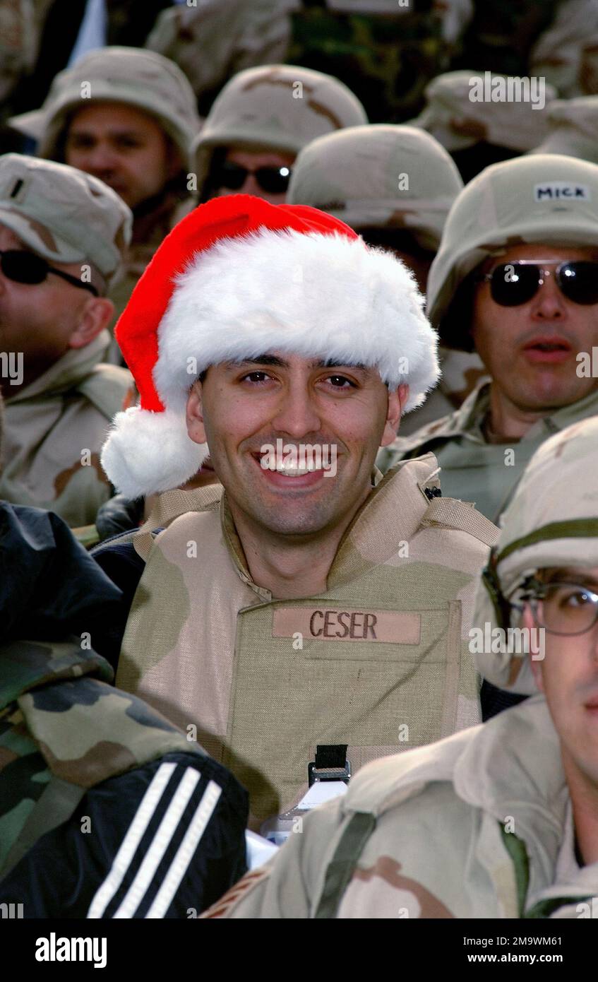 Festive audience member US Air Force (USAF) SENIOR AIRMAN (SRA) Michael ...