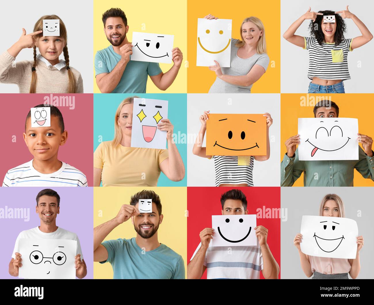 Group of happy people with drawn smiles on paper sheets against color ...