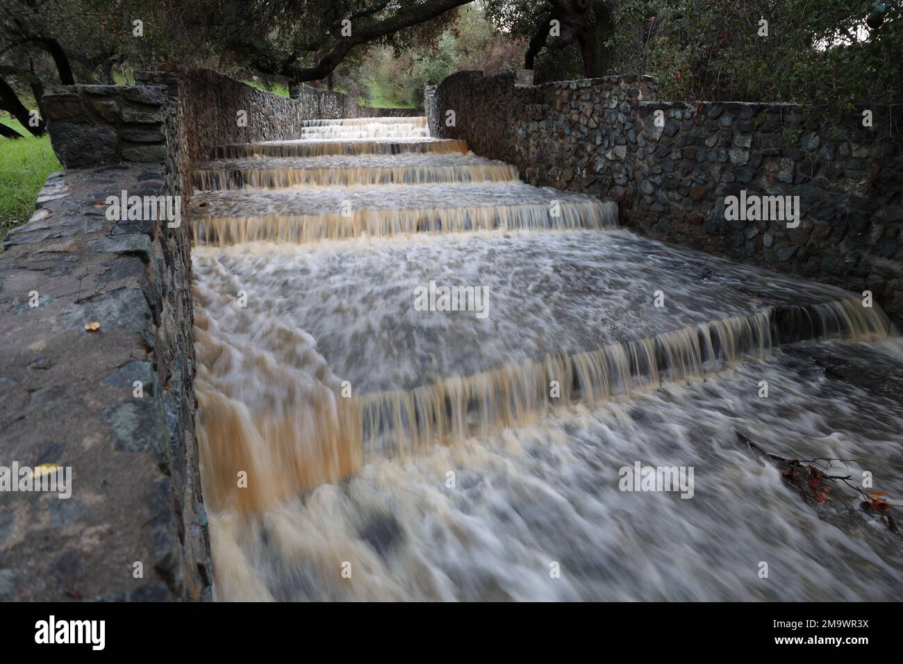 water stream through brick passageway Stock Photo - Alamy