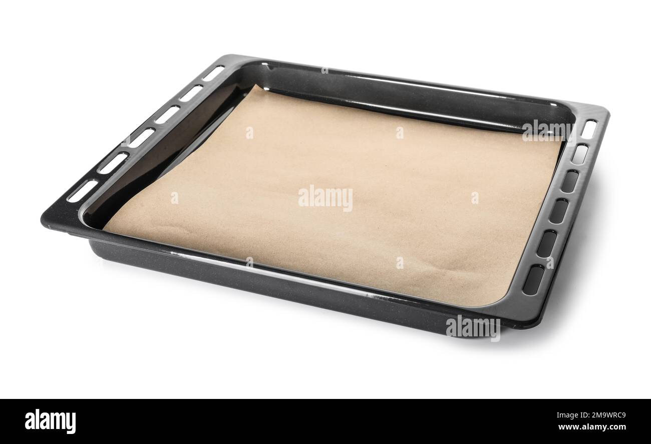 Metal baking tray for oven with parchment paper on white background ...