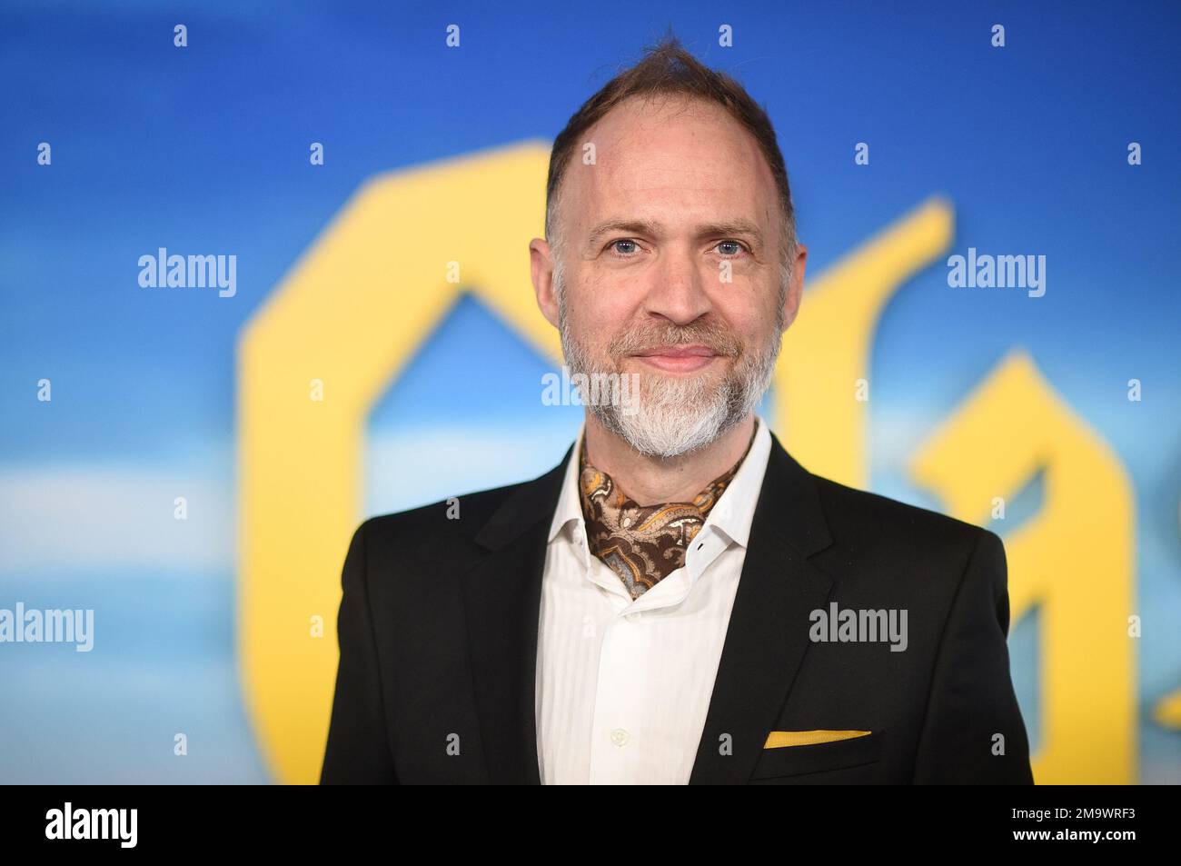 Nathan Johnson arrives at the premiere of "Glass Onion: A Knives Out ...