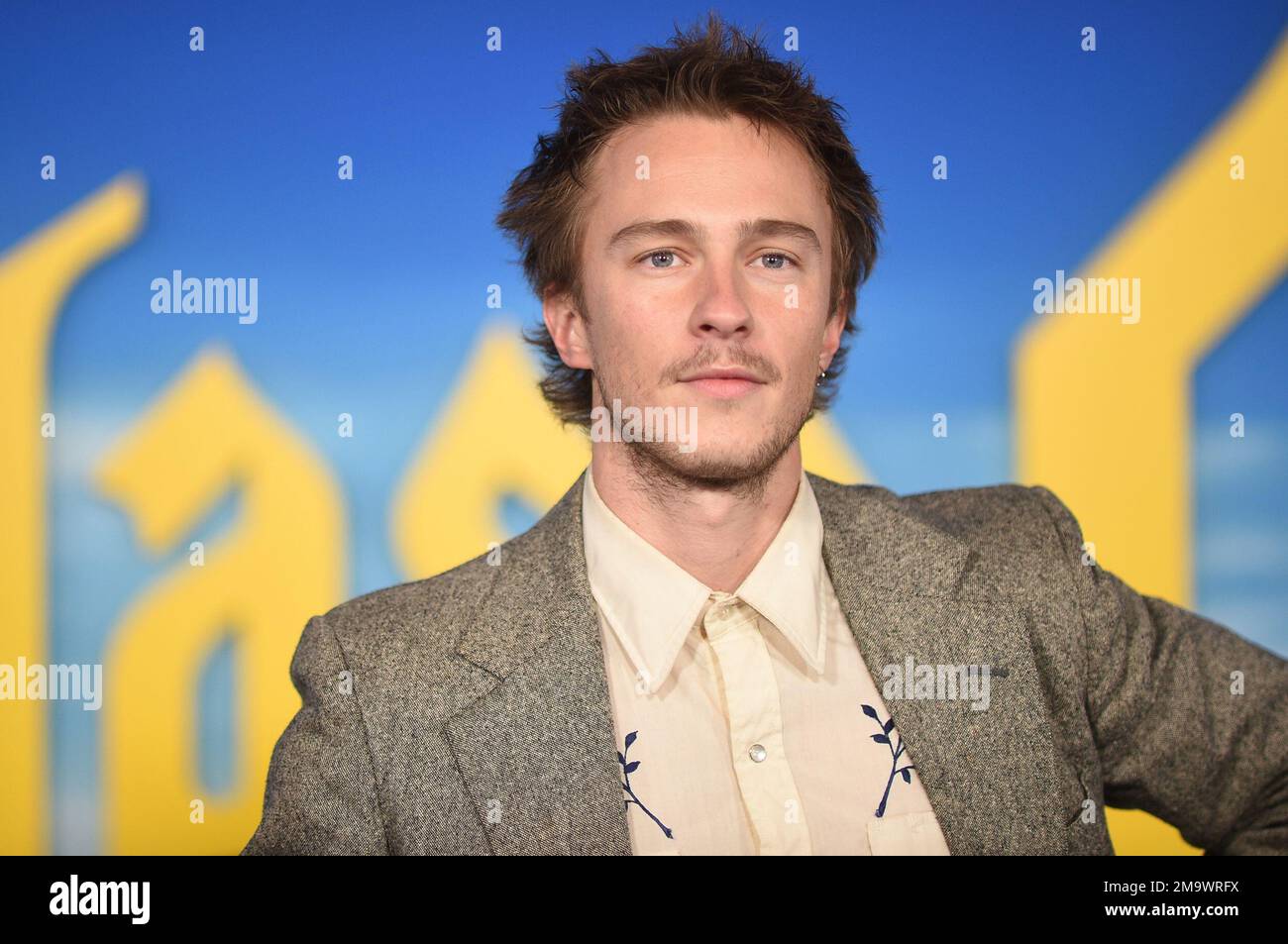 Drew Starkey arrives at the premiere of "Glass Onion: A Knives Out ...