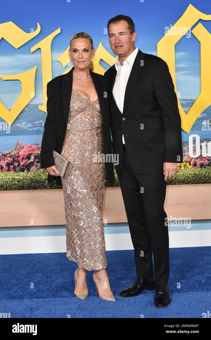 Molly Sims, left, and Scott Stuber arrive at the premiere of "Glass ...