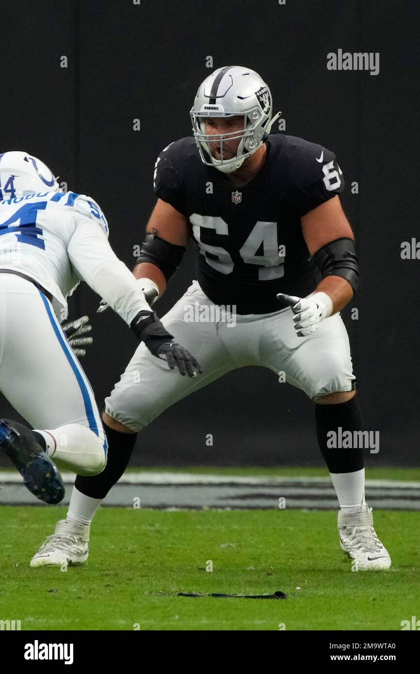 Las Vegas Raiders guard Alex Bars (64) lines up against the ...