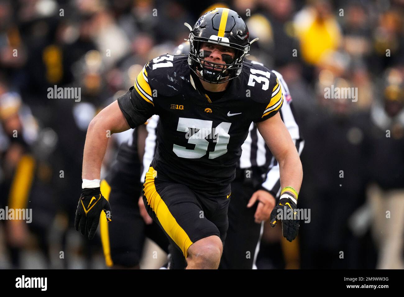 Iowa linebacker Jack Campbell runs on the field during the first half ...