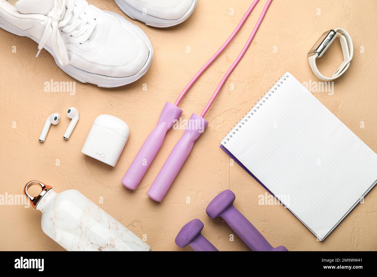 Skipping rope, earphones, bottle, dumbbells, notebook, smartwatch and ...