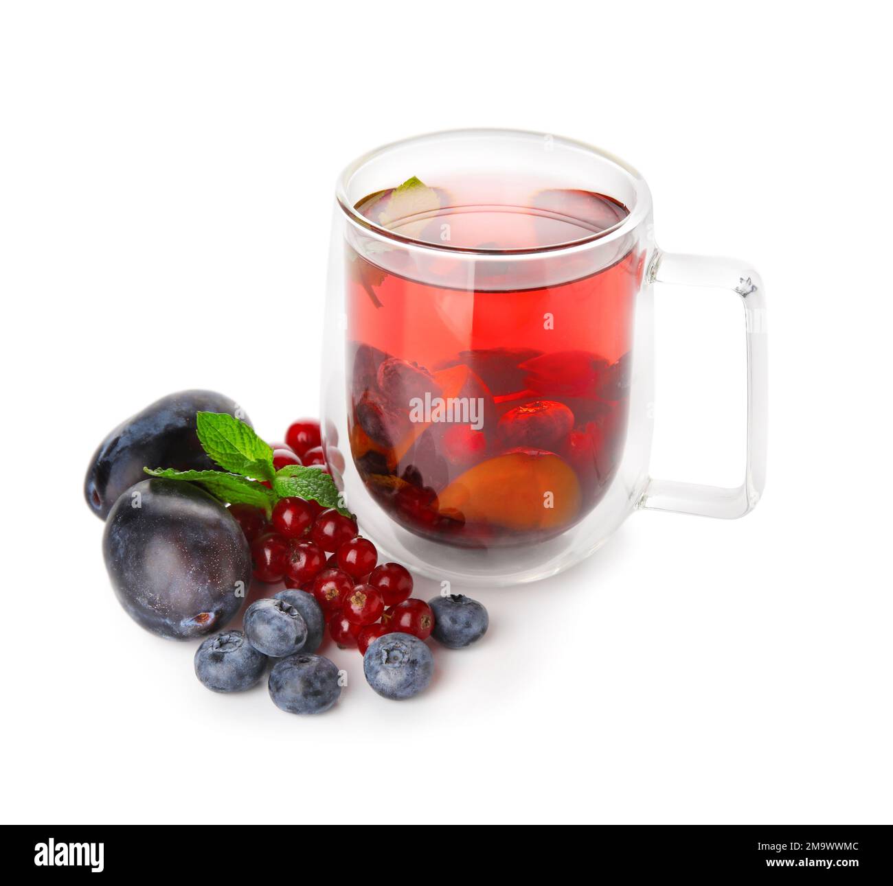 Glass cup of fruit tea with berries and mint on white background Stock ...