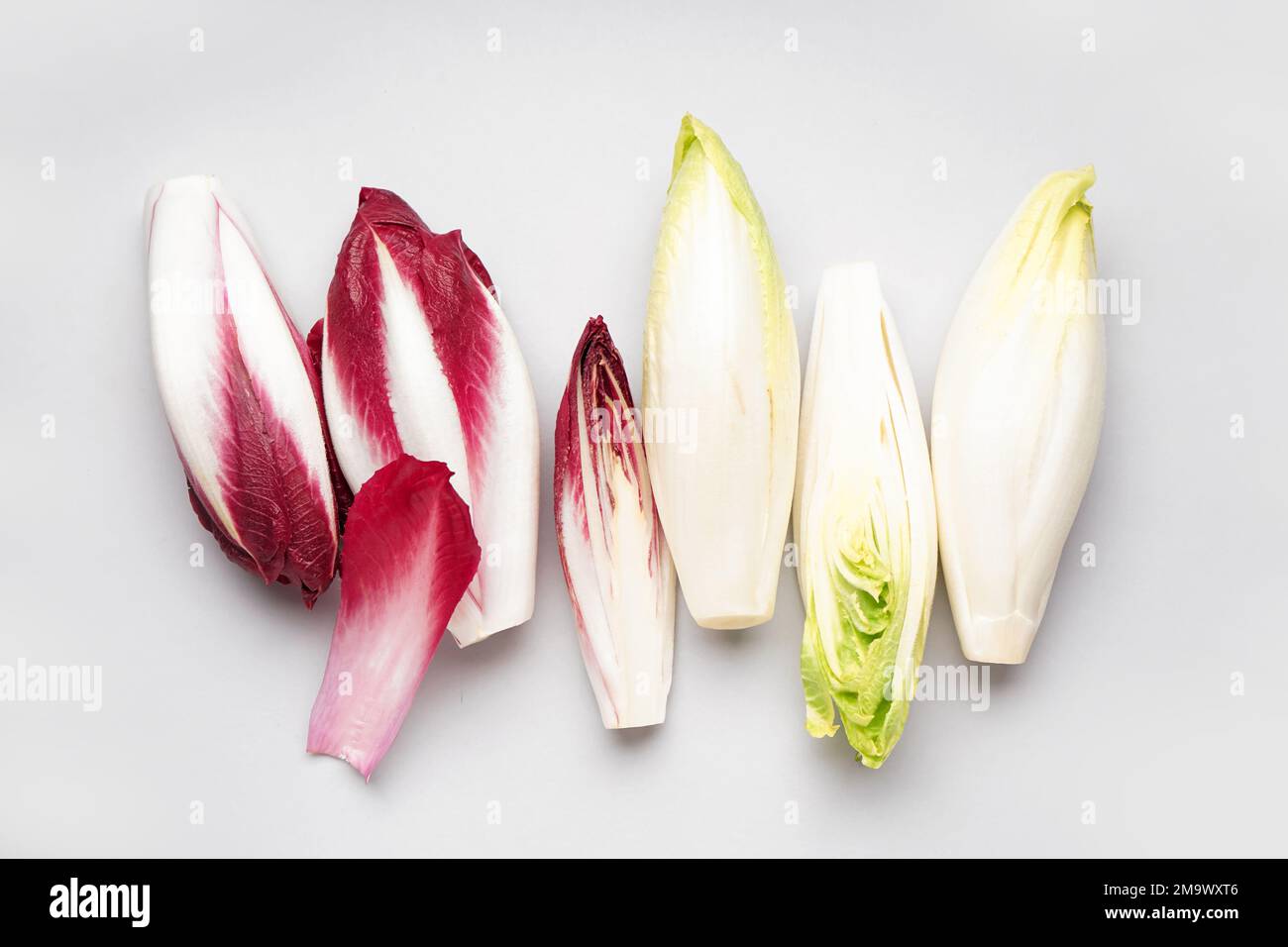 Bunches of fresh endive on white background Stock Photo - Alamy
