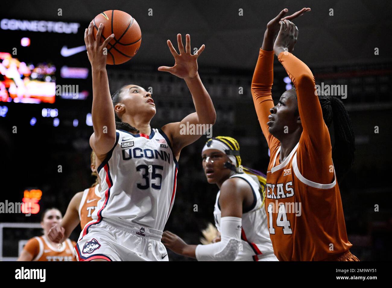Connecticut's Azzi Fudd (35) shoots as Texas' Amina Muhammad (14 ...