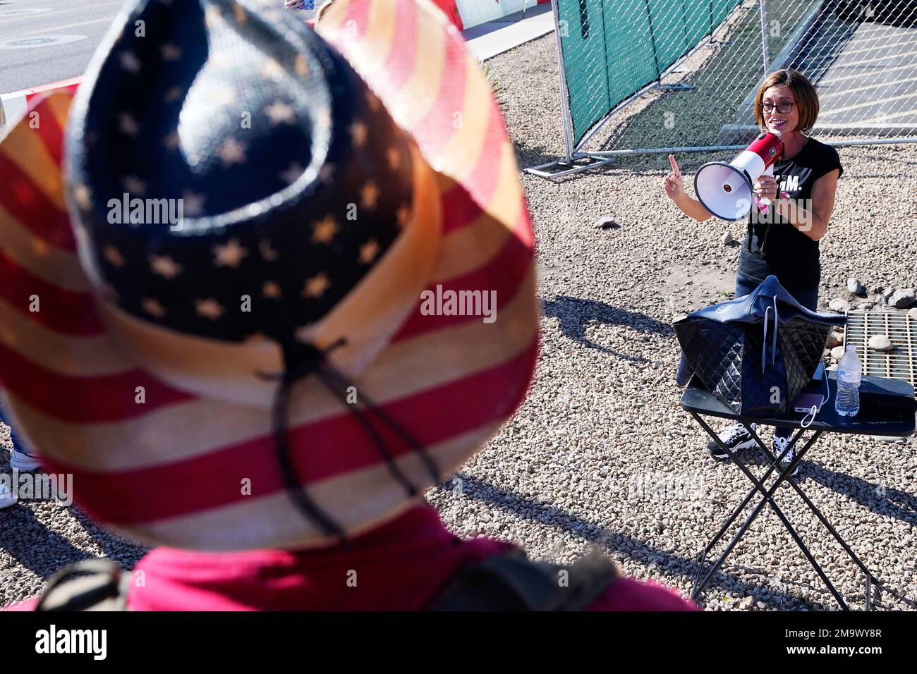 Protesters hold a rally at the Maricopa County Recorder's Office in ...