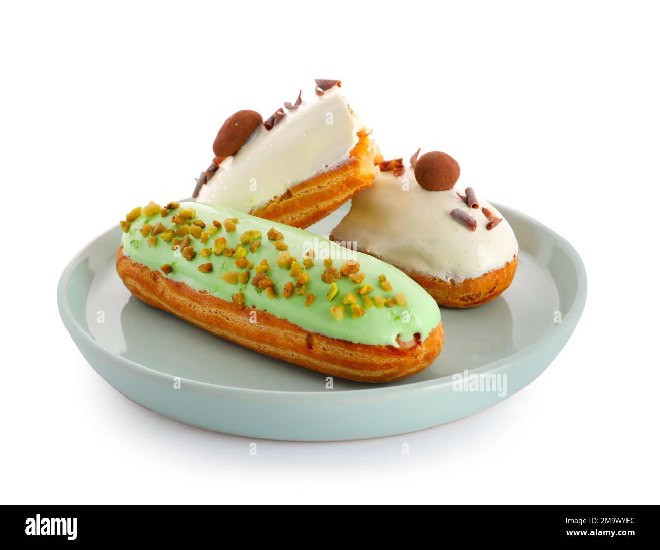 Plate with delicious eclairs isolated on white background Stock Photo ...