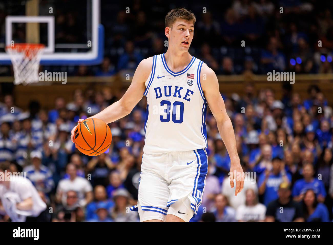 Duke's Kyle Filipowski (30) handles the ball during an NCAA college ...