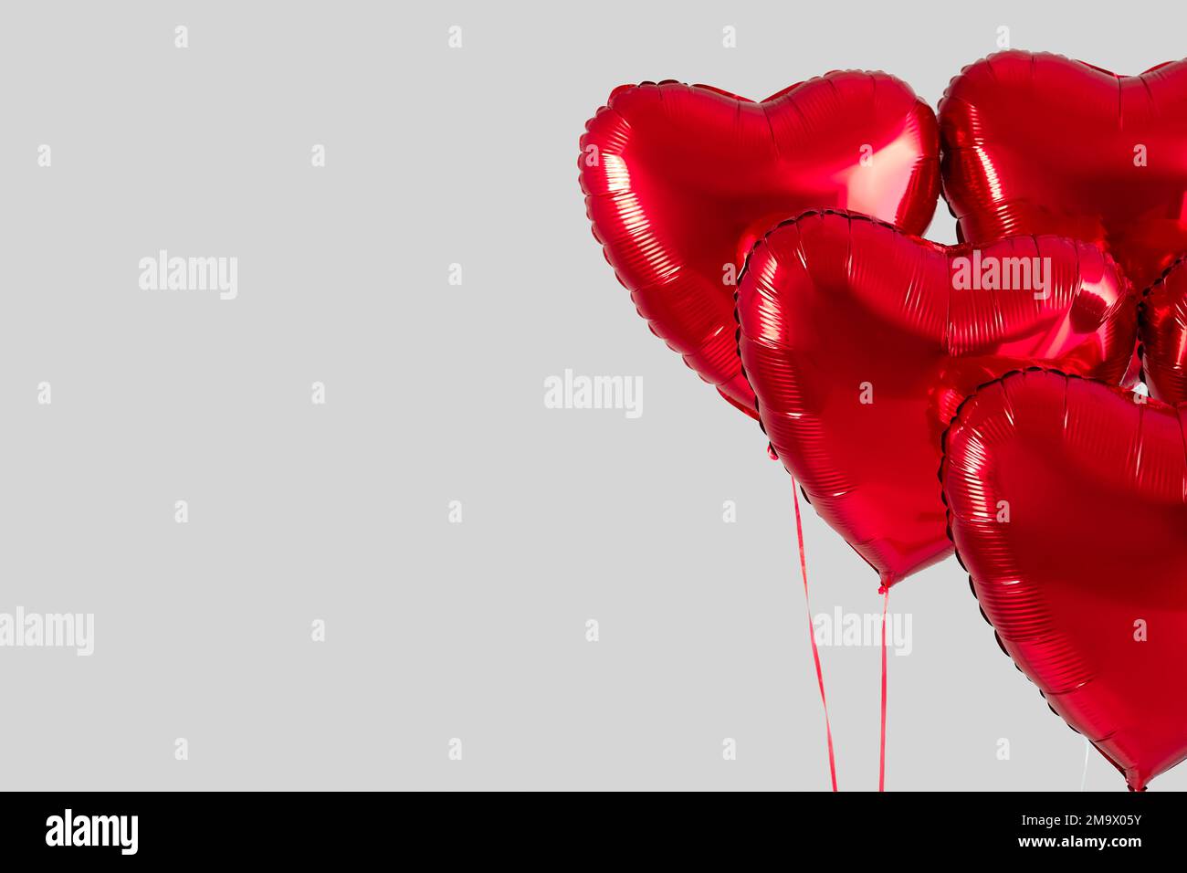 Heart shaped balloons for Valentine's Day on light background Stock ...