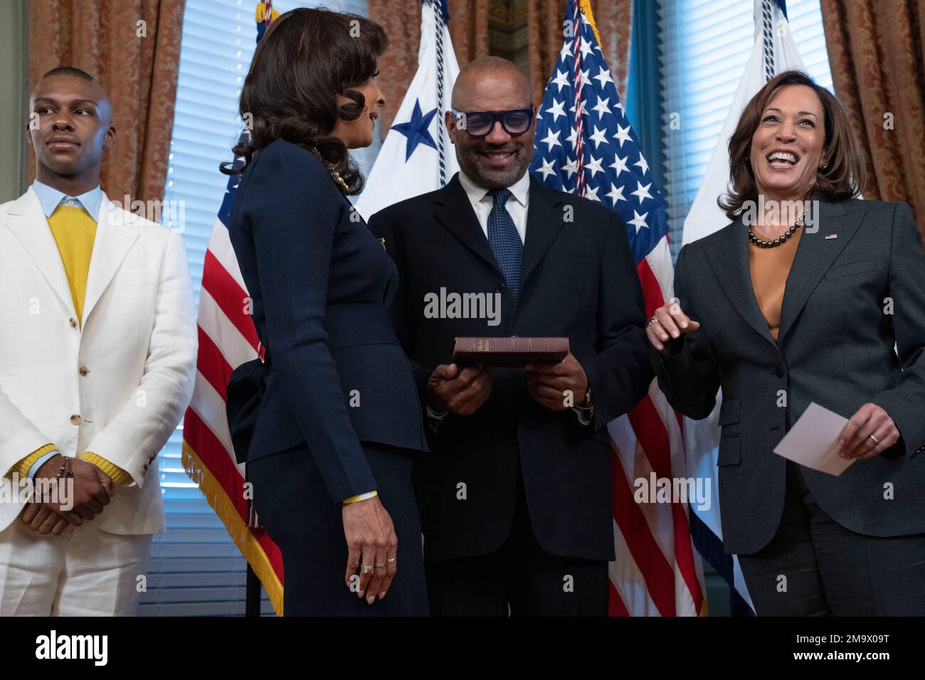 Vice President Kamala Harris, right, laughs with Candace Bond, second ...