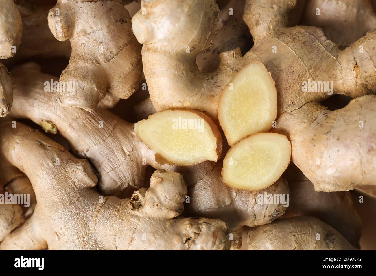Texture of fresh ginger as background Stock Photo - Alamy