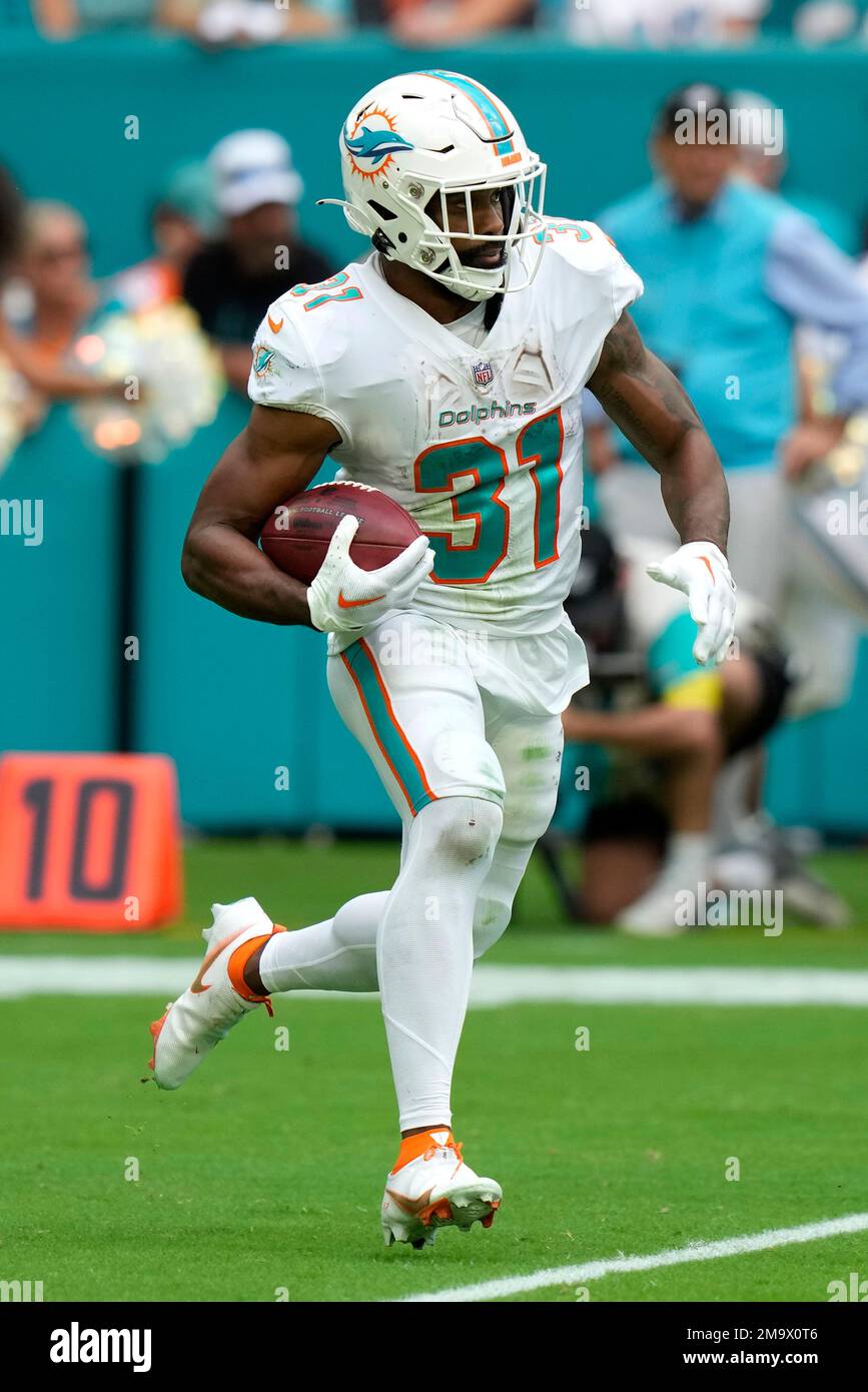 Miami Dolphins running back Raheem Mostert (31) runs during the second half of an NFL football ...