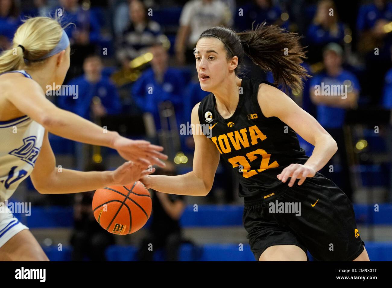 Iowa guard Caitlin Clark (22) drives up court during the first half of ...