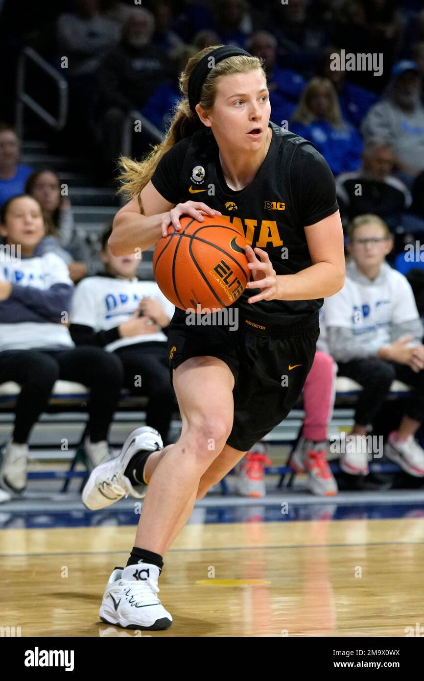 Iowa guard Molly Davis drives up court during the first half of an NCAA ...