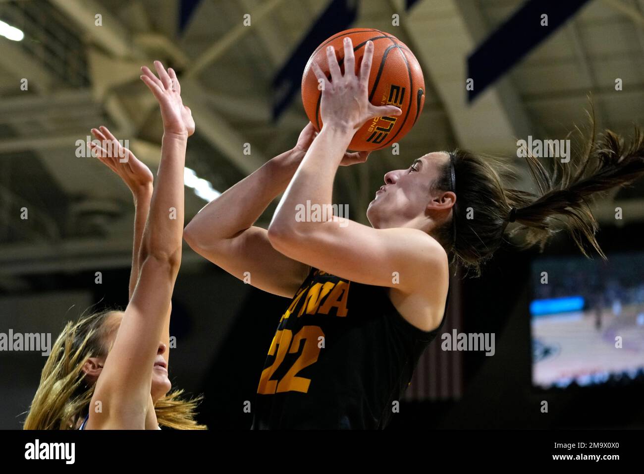 Iowa guard Caitlin Clark (22) shoots over a Drake defender during the ...