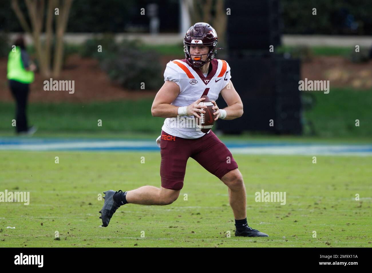 Virginia Tech's Grant Wells (6) looks to throw during an NCAA college ...