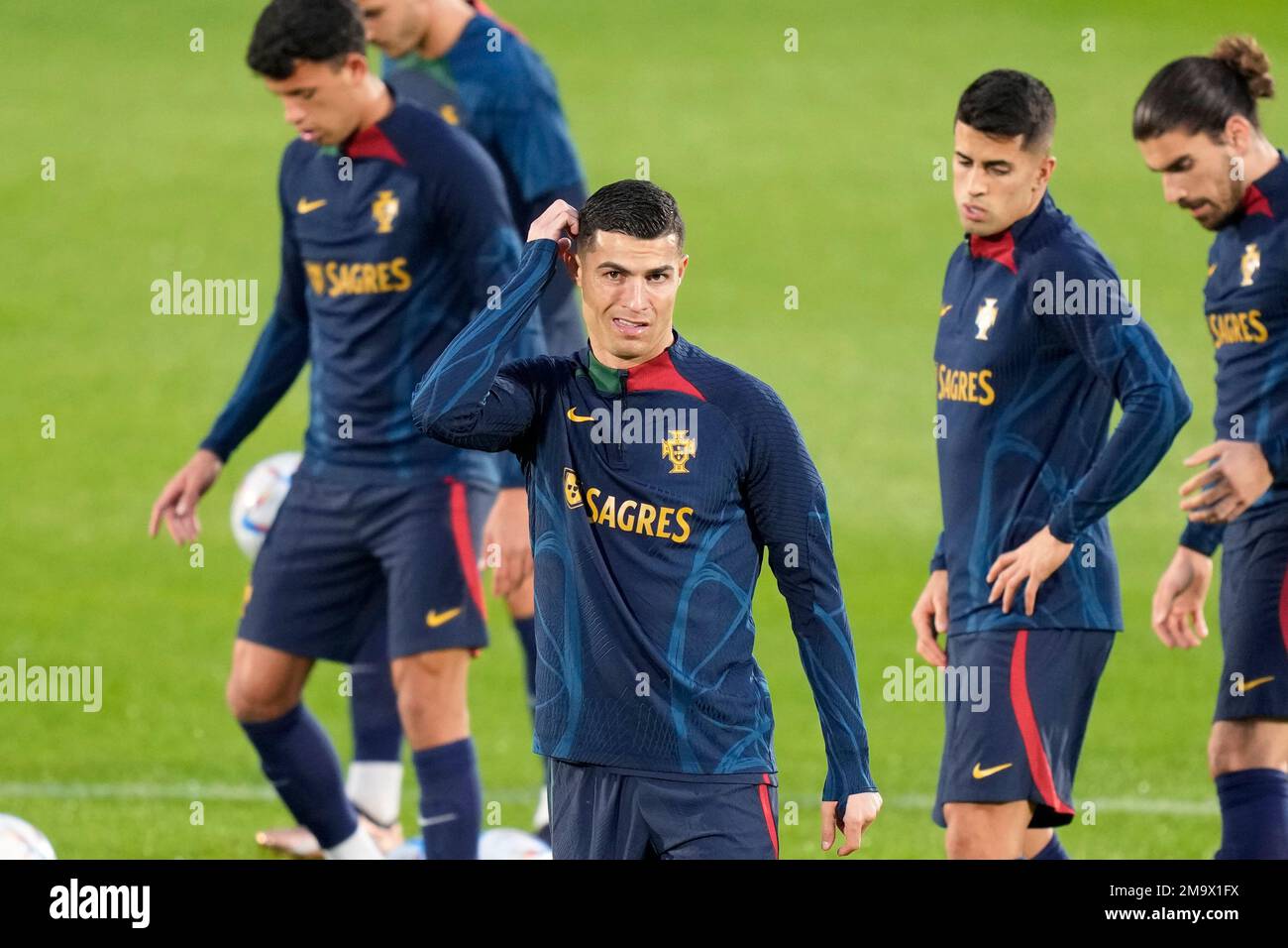 Cristiano Ronaldo, center, scratches his head during a Portugal soccer ...