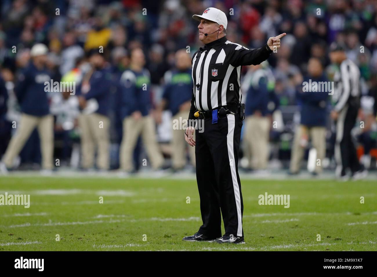 Referee John Hussey (35) works during an NFL football game between the ...