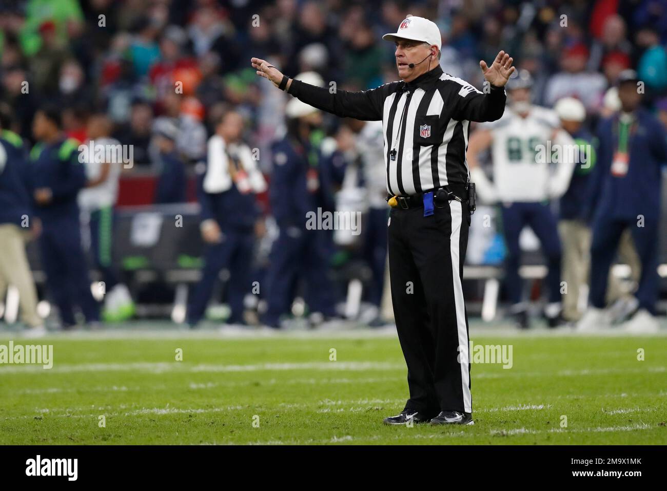 Referee John Hussey (35) works during an NFL football game between the ...