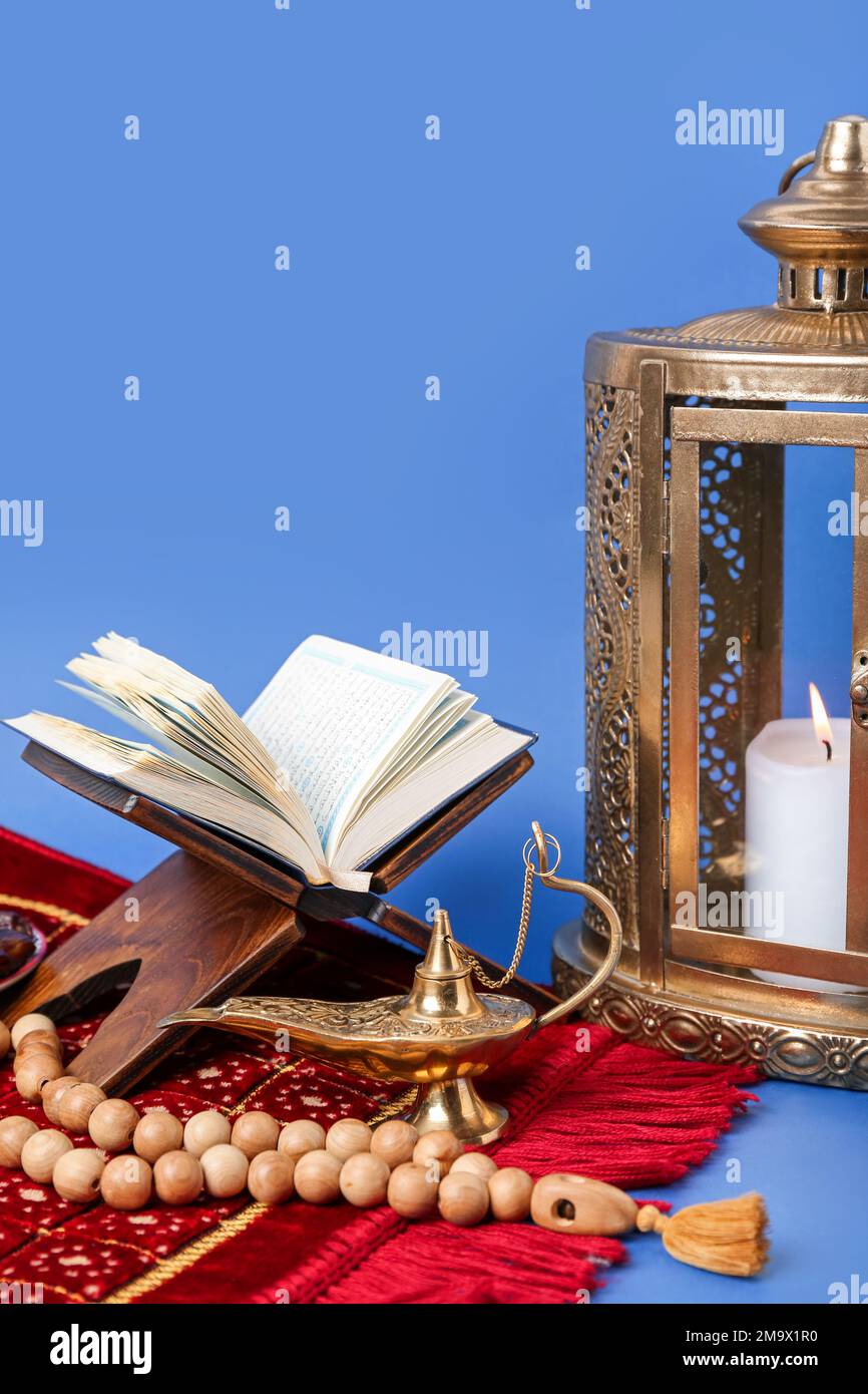 Aladdin lamp, prayer beads, Koran and Muslim lantern for Ramadan on ...