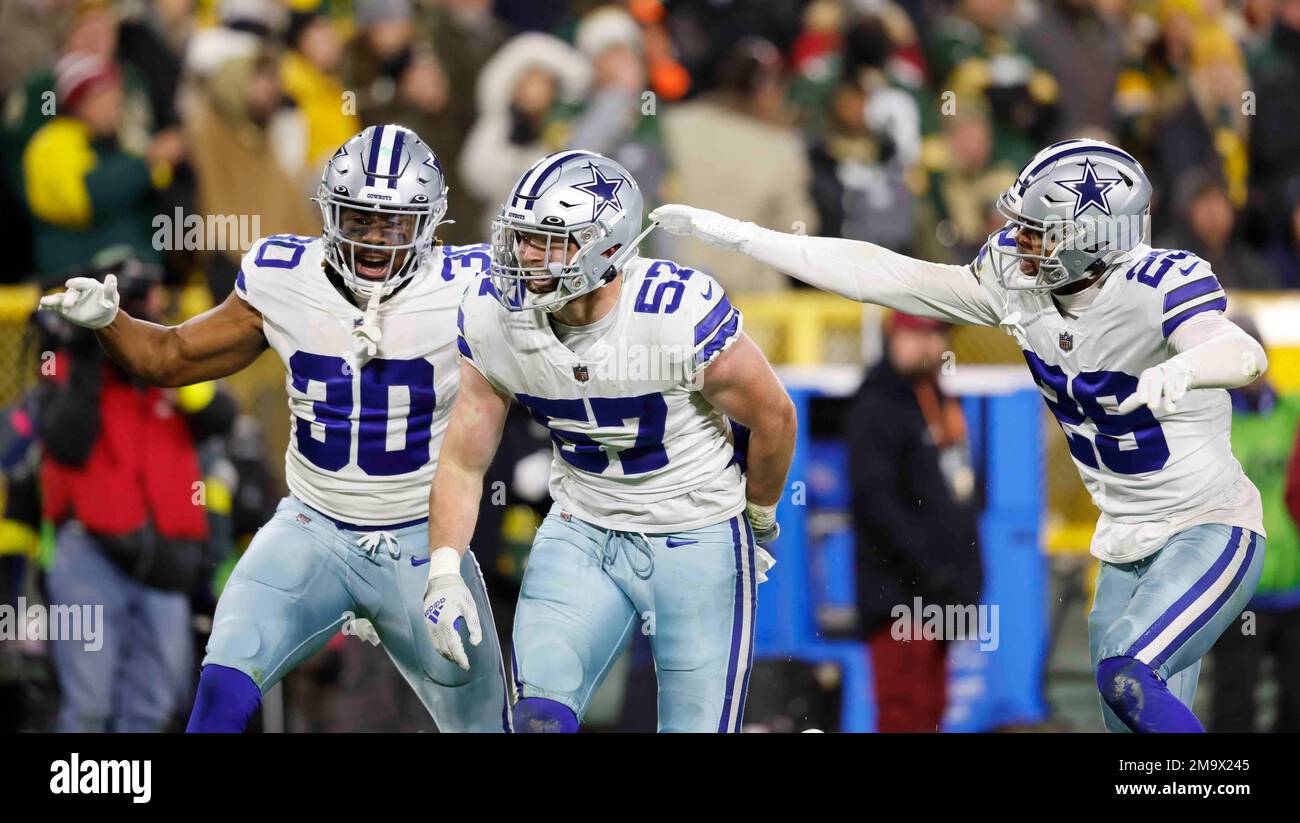 Dallas Cowboy players react after a play during an NFL game against the ...