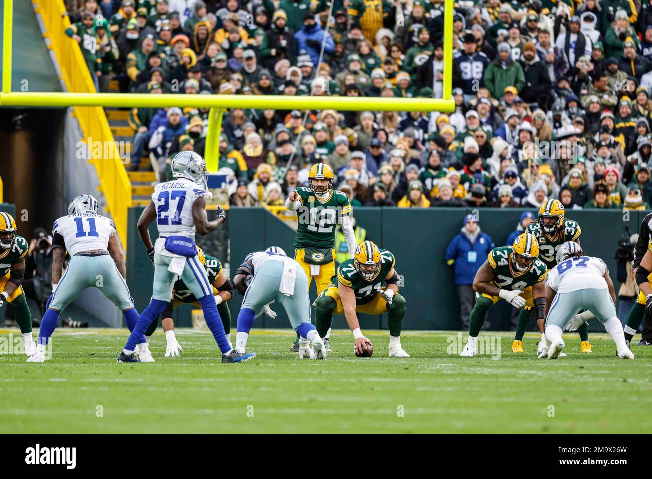 Green Bay Packers quarterback Aaron Rodgers (12) signals during an NFL ...