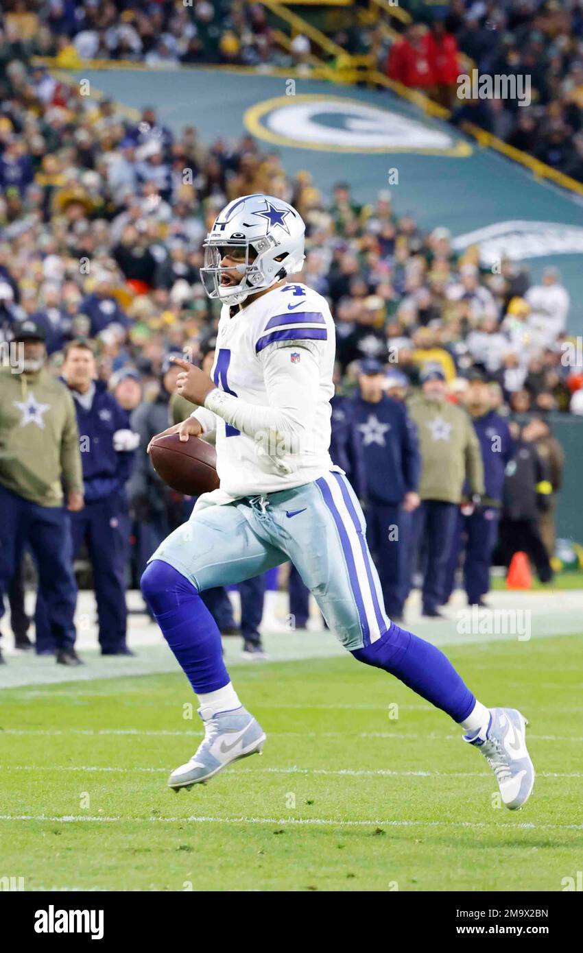 Dallas Cowboys quarterback Dak Prescott (4) runs against the Green Bay ...