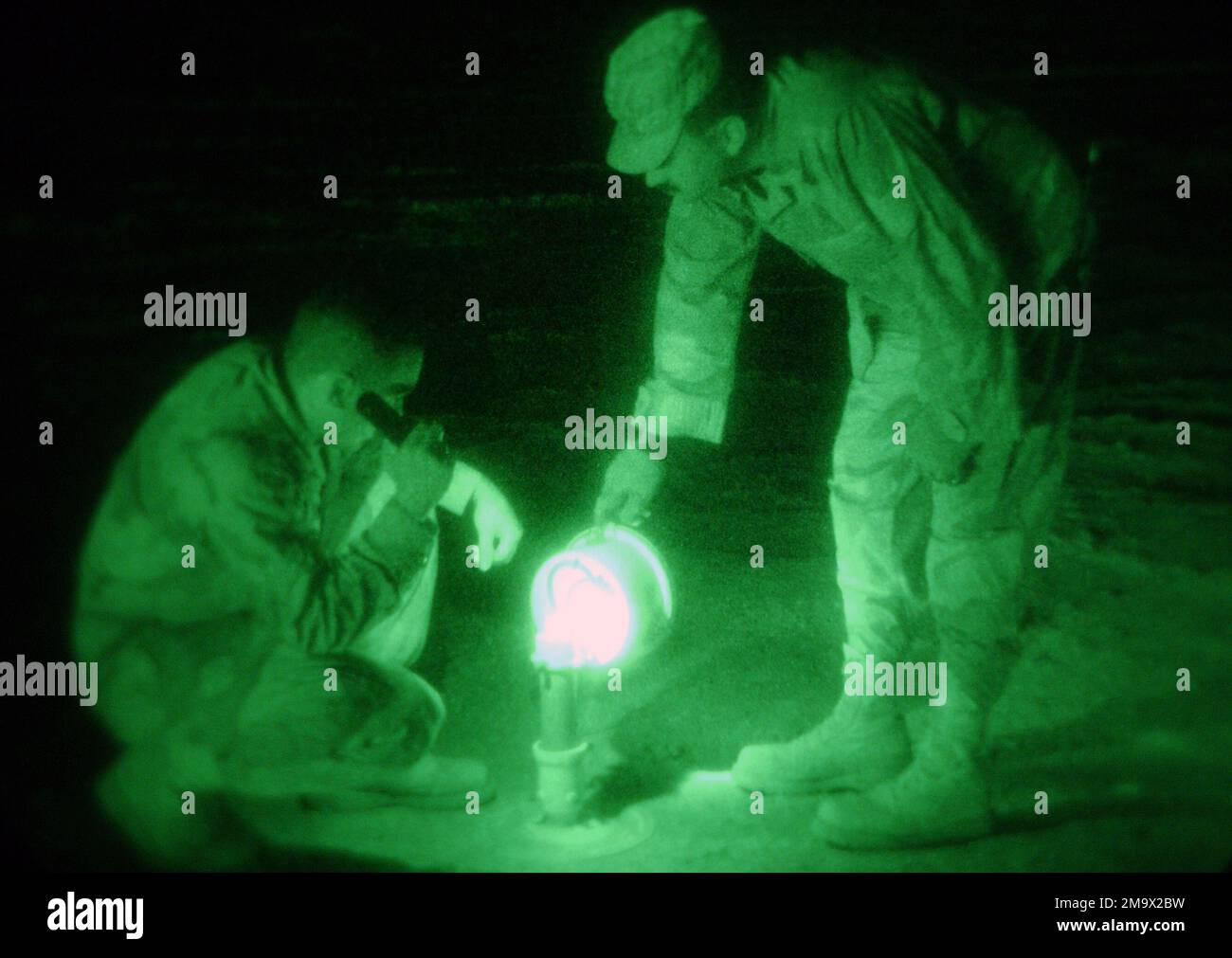 US Air Force (USAF) AIRMAN First Class (A1C) David Eiler, left and ...