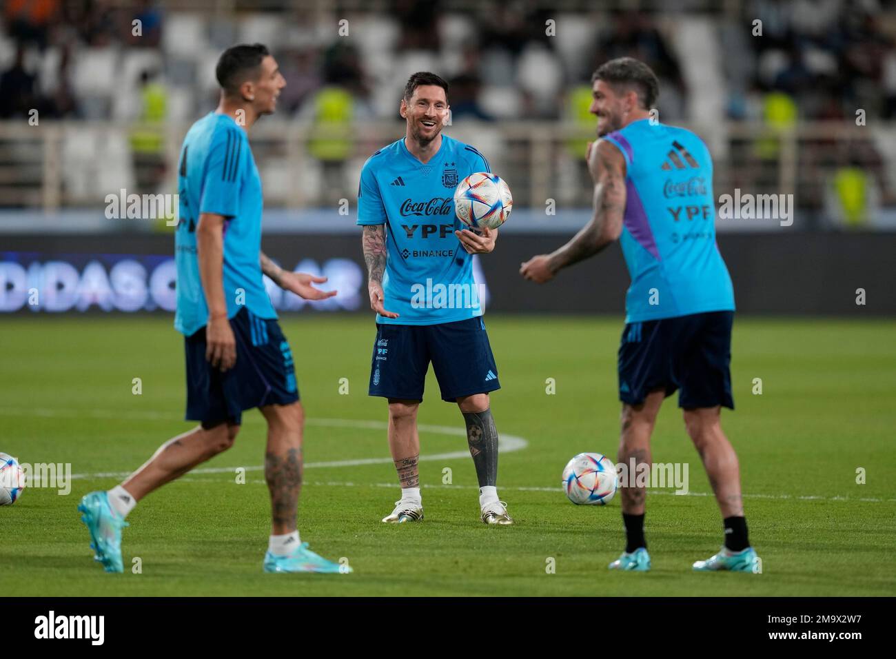 Argentina's Lionel Messi, middle, laughs with his teammates during a ...