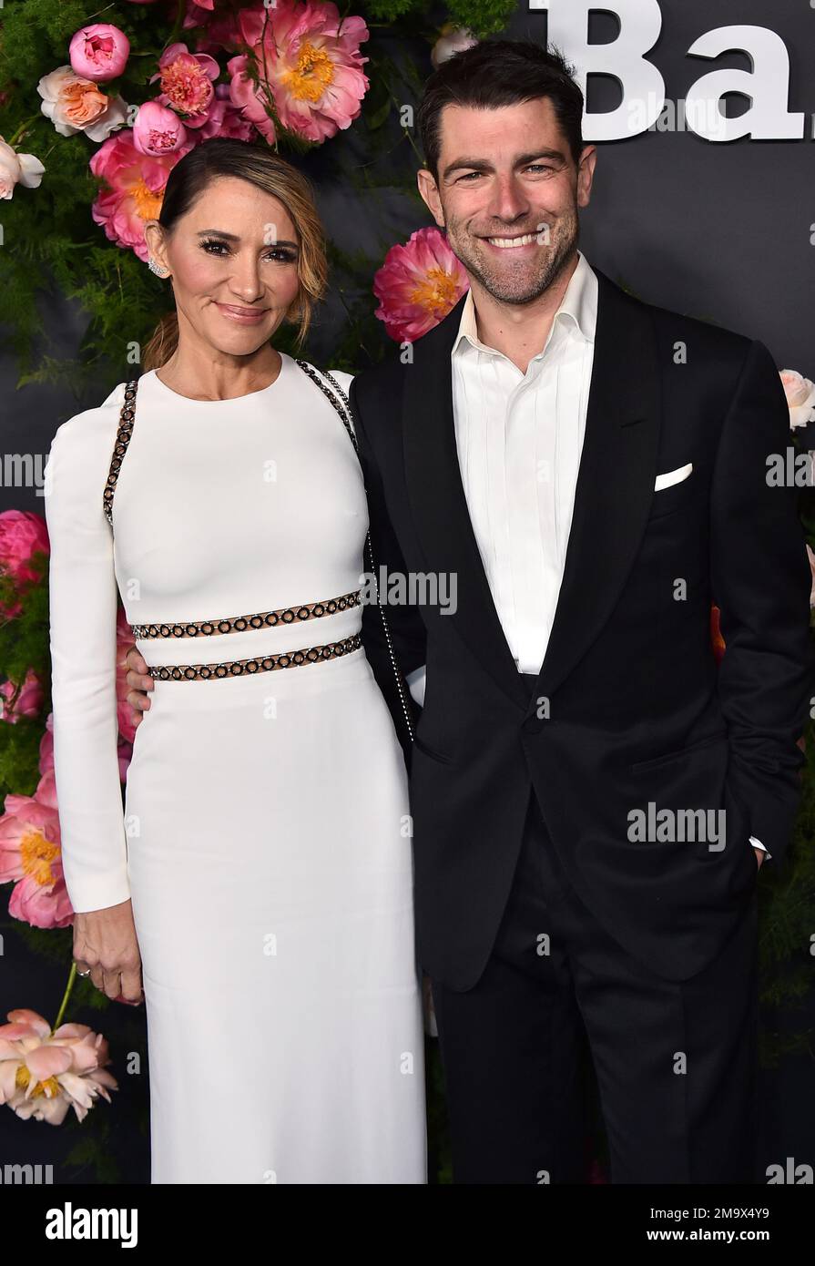 Tess Sanchez, left, and Max Greenfield arrive at the 2022 Baby2Baby ...