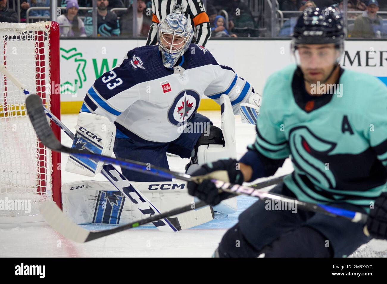 Winnipeg Jets goaltender David Rittich (33) watches the play against ...